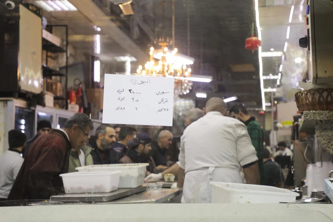 Syrians taste freedom at famous Damascus ice cream parlour | The ...