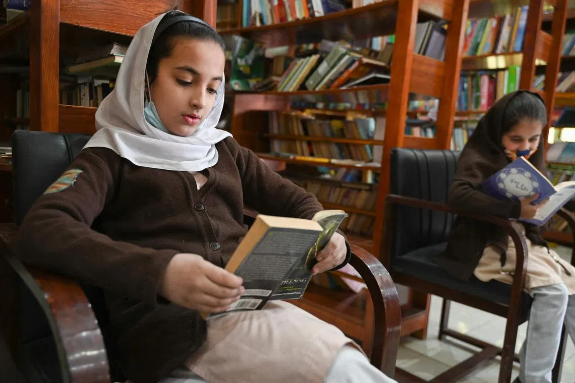 Library thrives in Pakistan's 'wild west' gun market town | The Straits ...