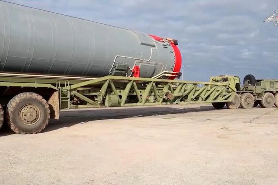 Russia loads missile with nuclear-capable glide vehicle into launch ...