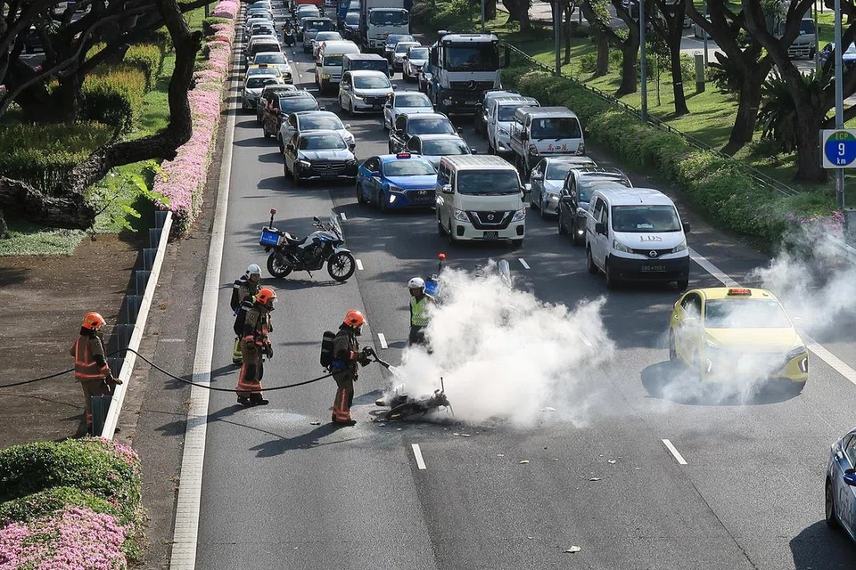Two taken to hospital after motorbike catches fire in accident with two ...