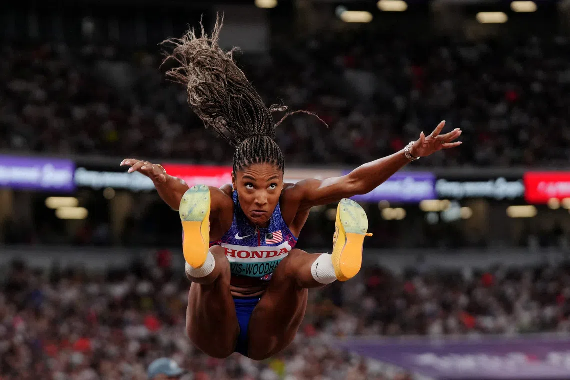 Davis-Woodhall adds world long jump title to Olympic crown | The ...
