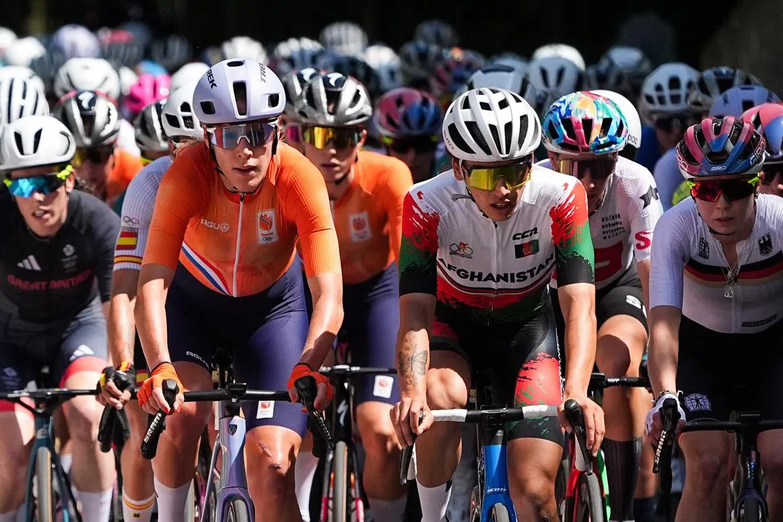 Afghan sisters cycle into Paris in pre-Taliban colours | The Straits Times