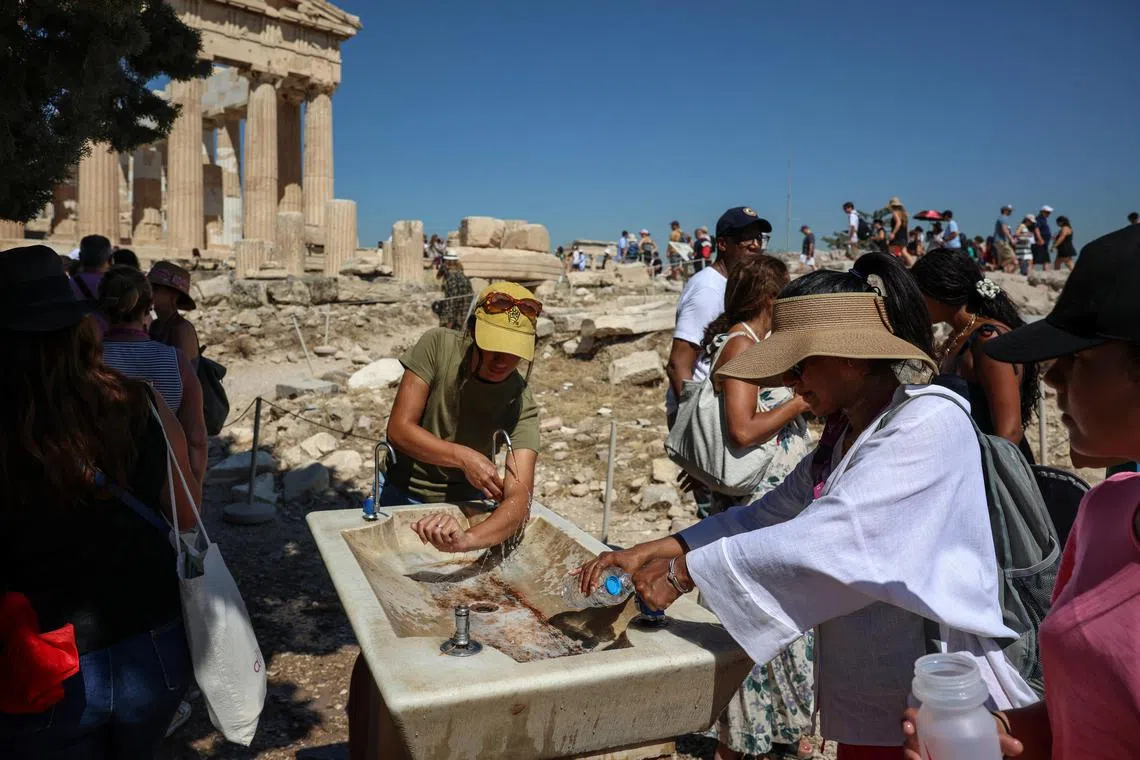 Acropolis shuts, outdoor work halted as heatwave scorches Greece | The Straits Times