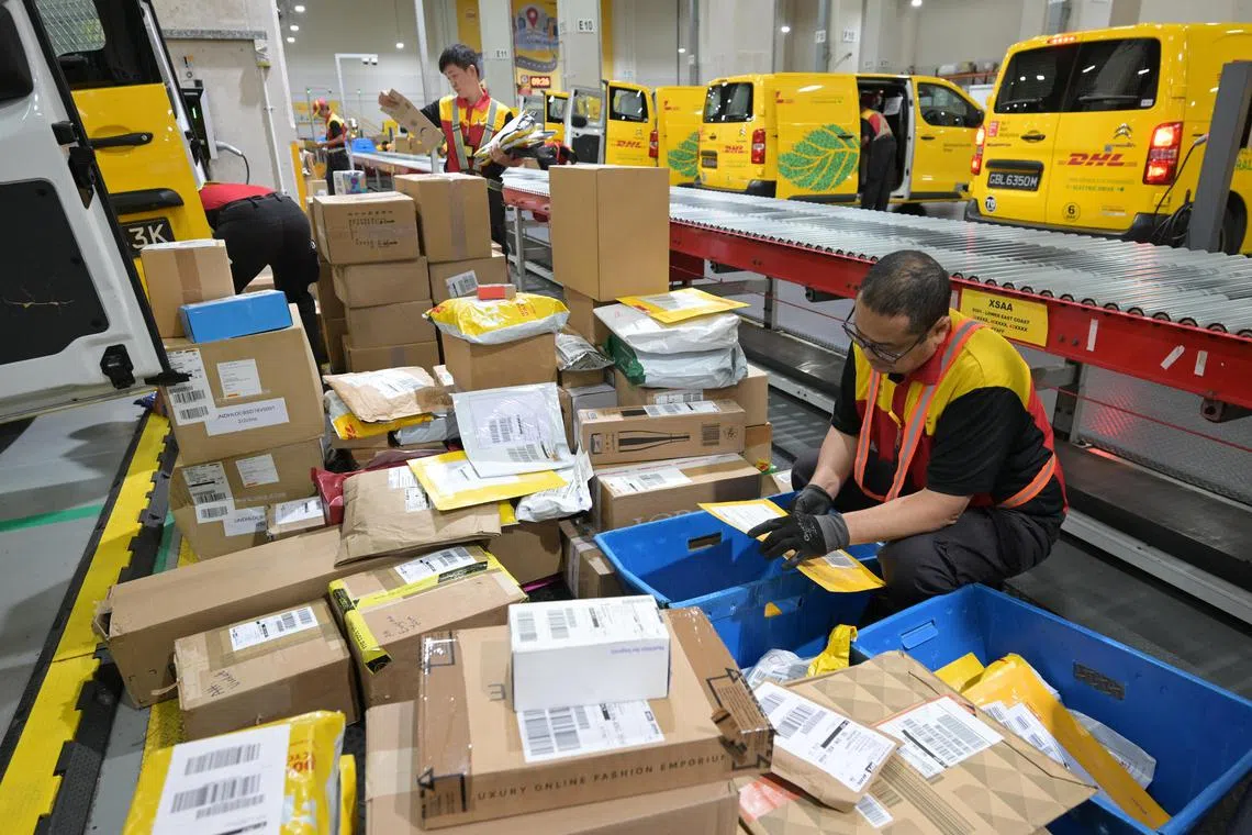 More staff, tech to cope with year-end shopping surge for delivery ...