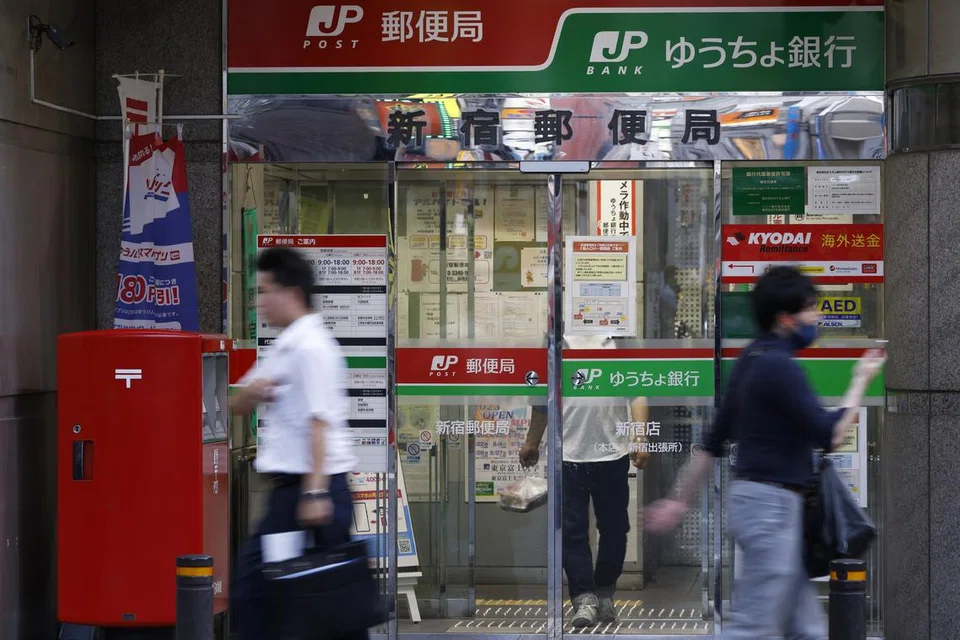 Japan Post planning $5.4 billion sale of shares in Japan Post Bank ...