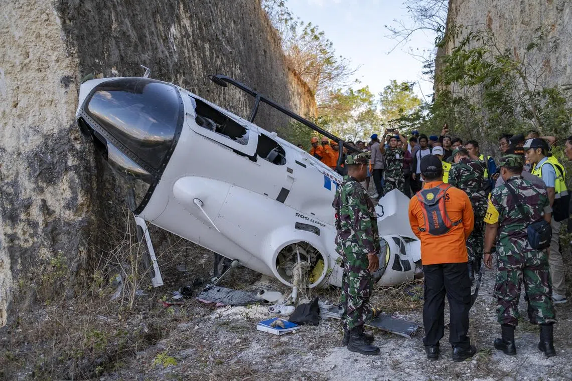 Five survive crash in Bali after helicopter gets entangled in kite ...