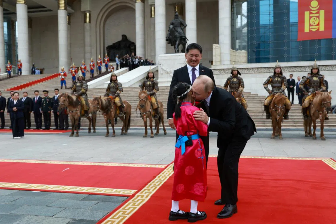 Putin gets lavish welcome in Mongolia despite ICC warrant | The Straits ...