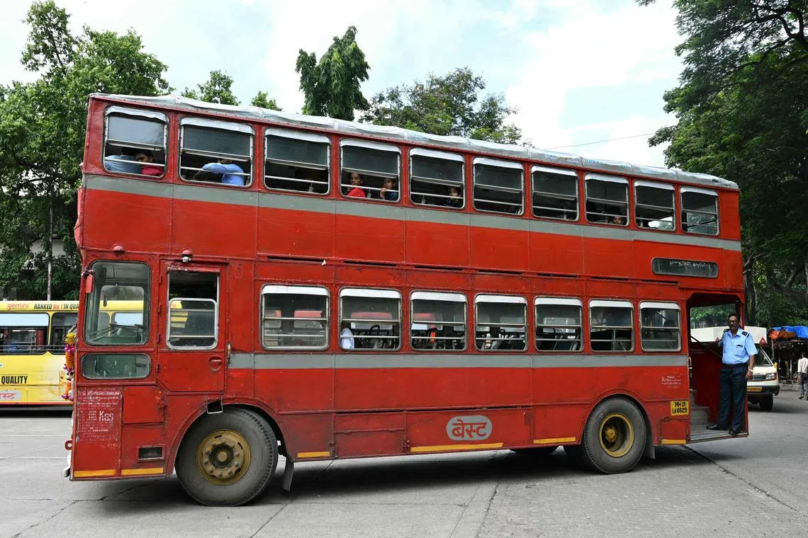 Mumbai bids farewell to beloved double-decker buses made famous by Bollywood films | The Straits ...