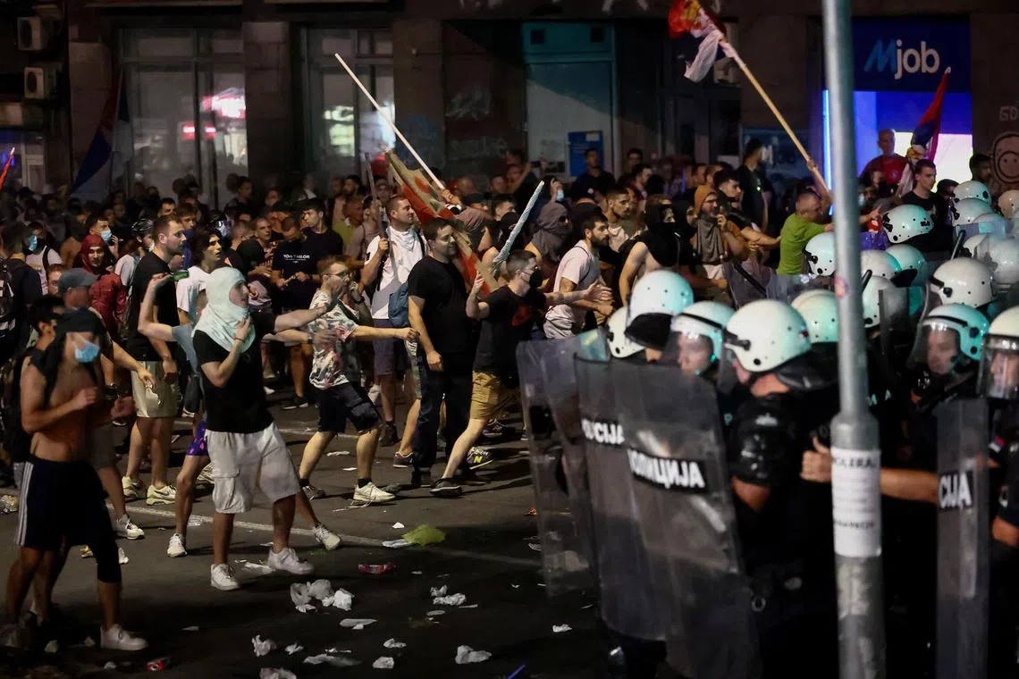 Serbia’s police clash with anti-government protesters demanding snap ...