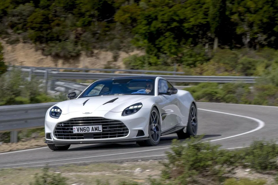 Car review: V12 performance and looks define the new Aston Martin ...