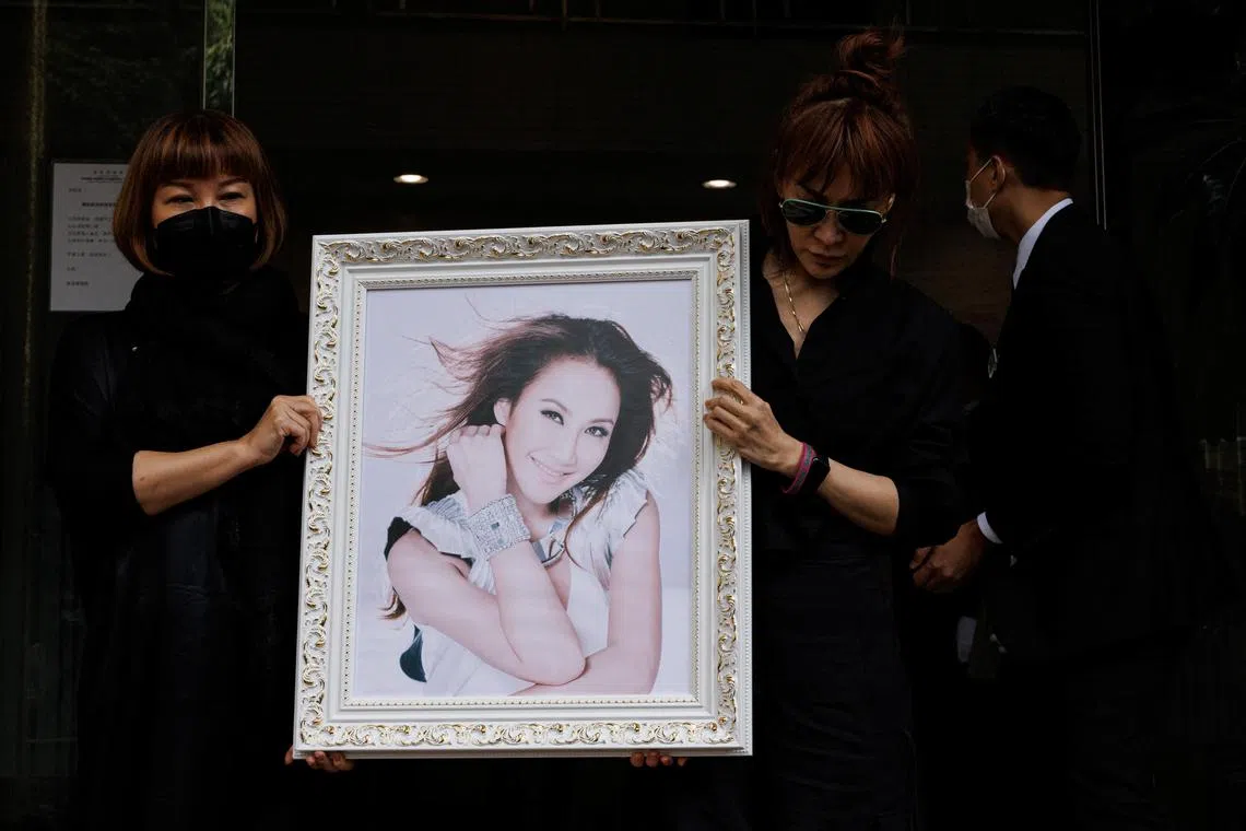 Late singer Coco Lee’s estranged husband says at crematorium he loved ...