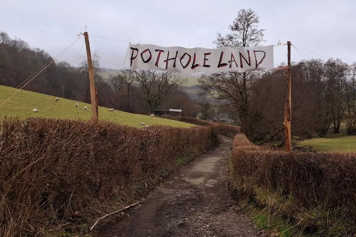 ‘Pothole Land’: Fed-up residents in Wales turn potholes into a tongue ...