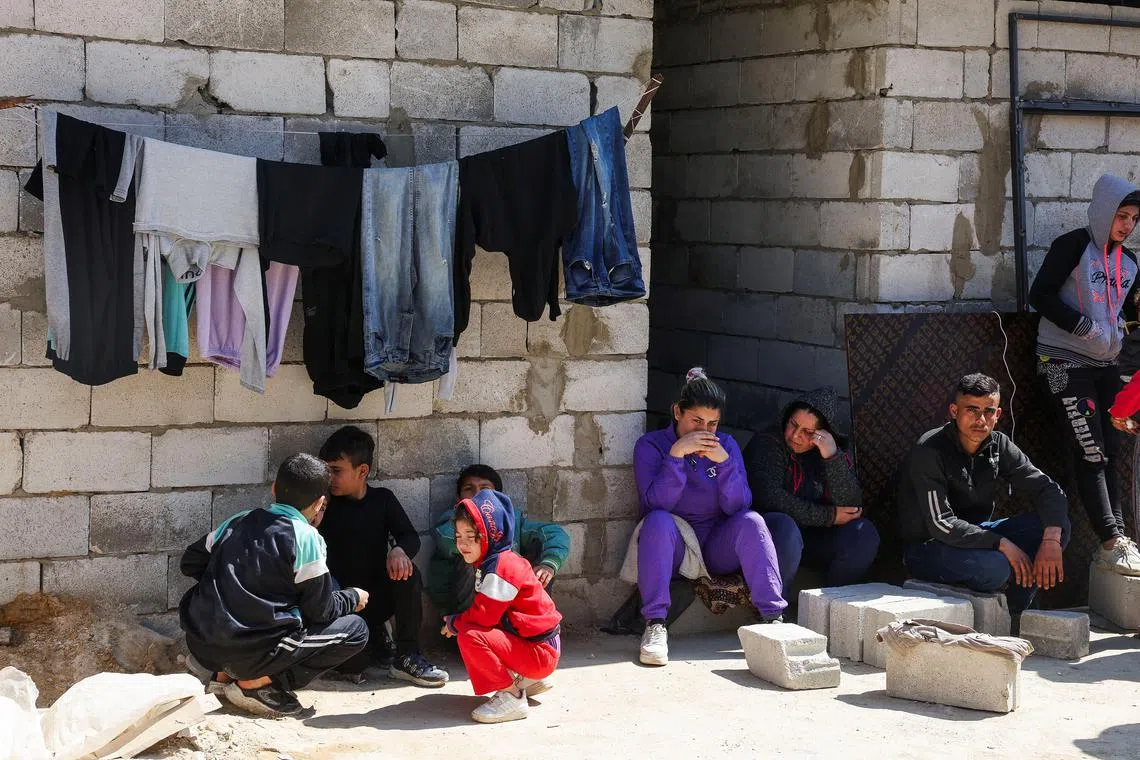 Syrians flee sectarian killing into Lebanon | The Straits Times