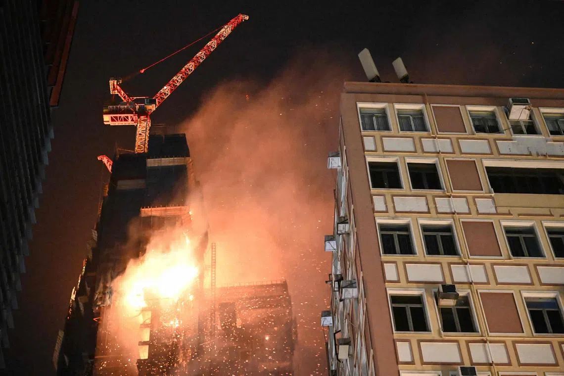 Massive fire engulfs Hong Kong high-rise construction site | The Straits Times