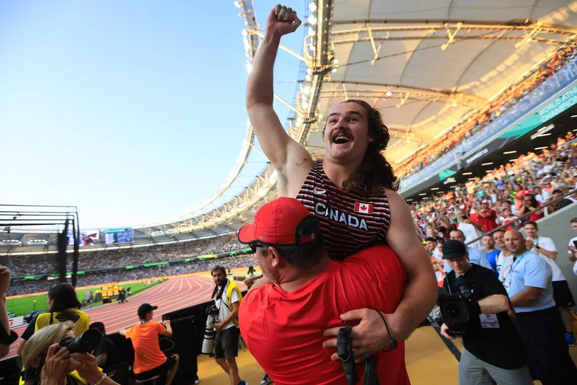 Ethan Katzberg takes shock hammer gold for Canada | The Straits Times