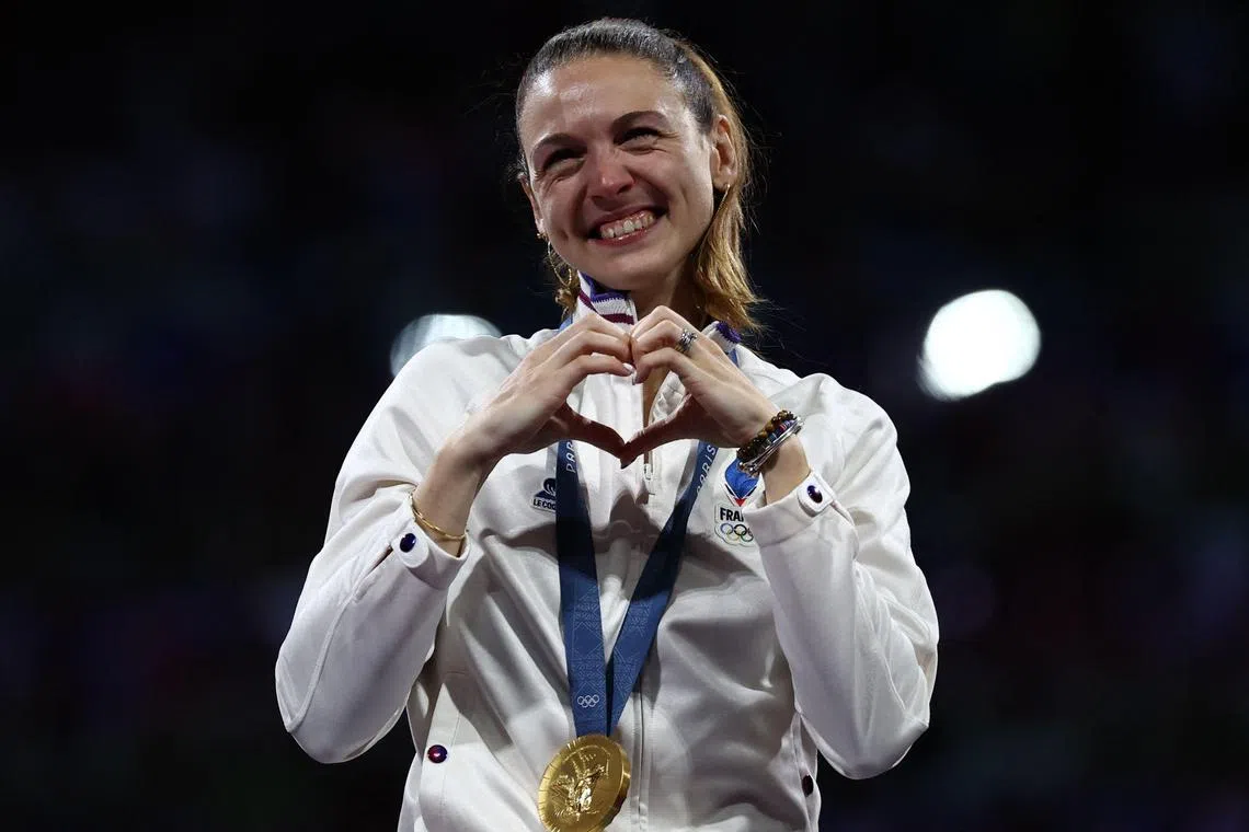 A French fencing queen is crowned in gold at the Grand Palais | The ...