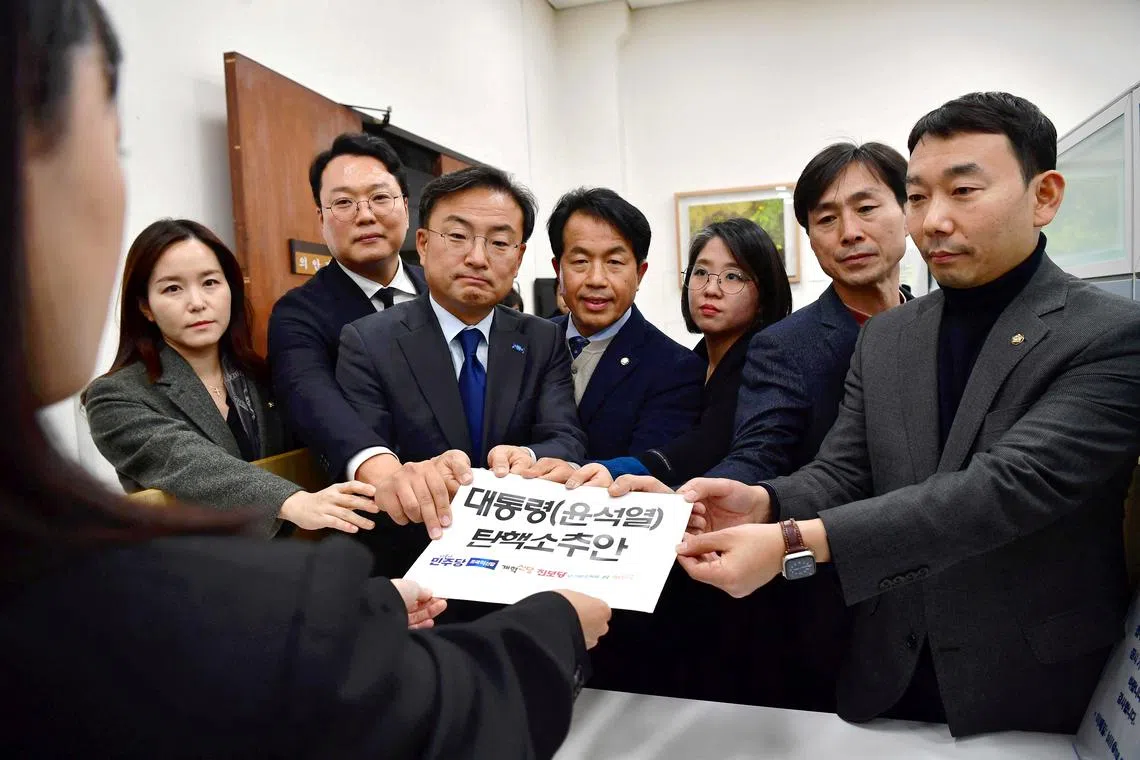 South Korea’s President Yoon faces impeachment after martial law ...