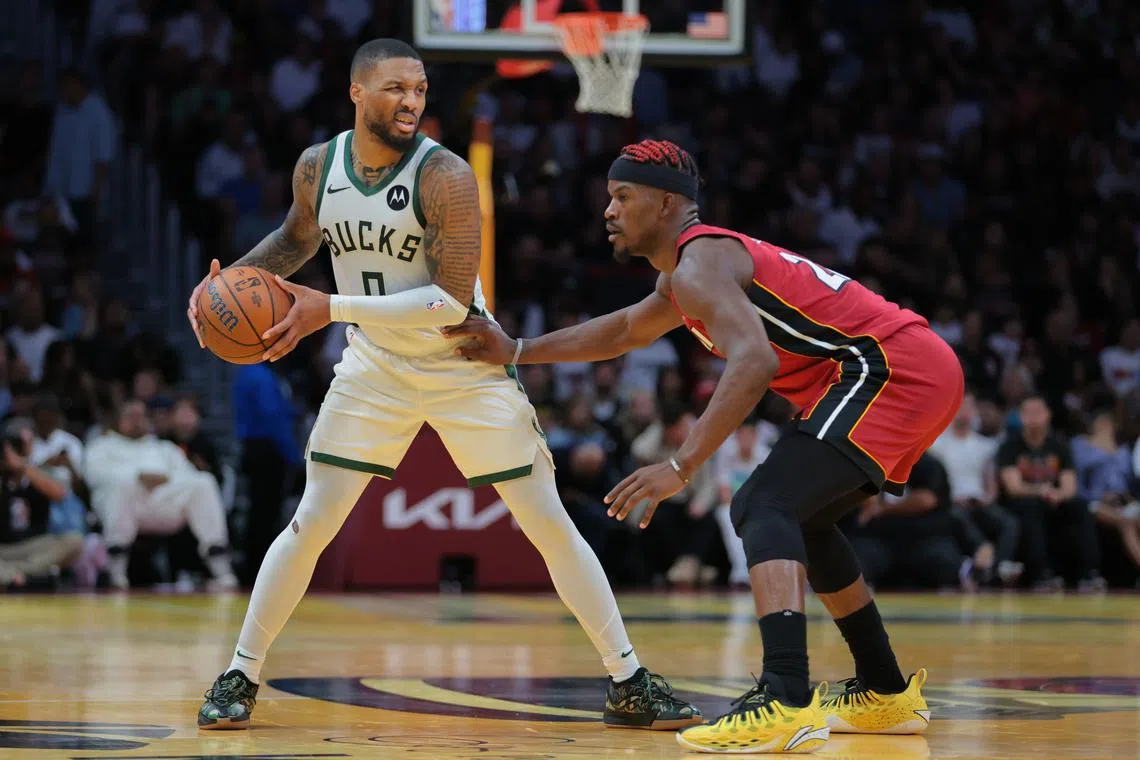 NBA roundup: Damian Lillard hoists banged-up Bucks over Heat | The Straits Times