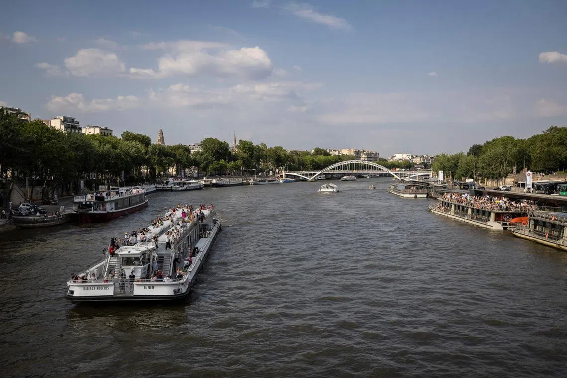 River Seine in Paris unfit for swimming one month before Olympics ...