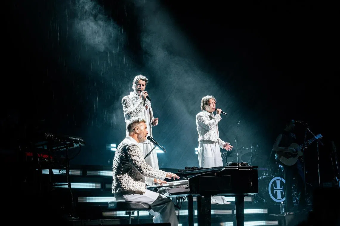 Concert review: Take That paid tribute to three eras of their history ...
