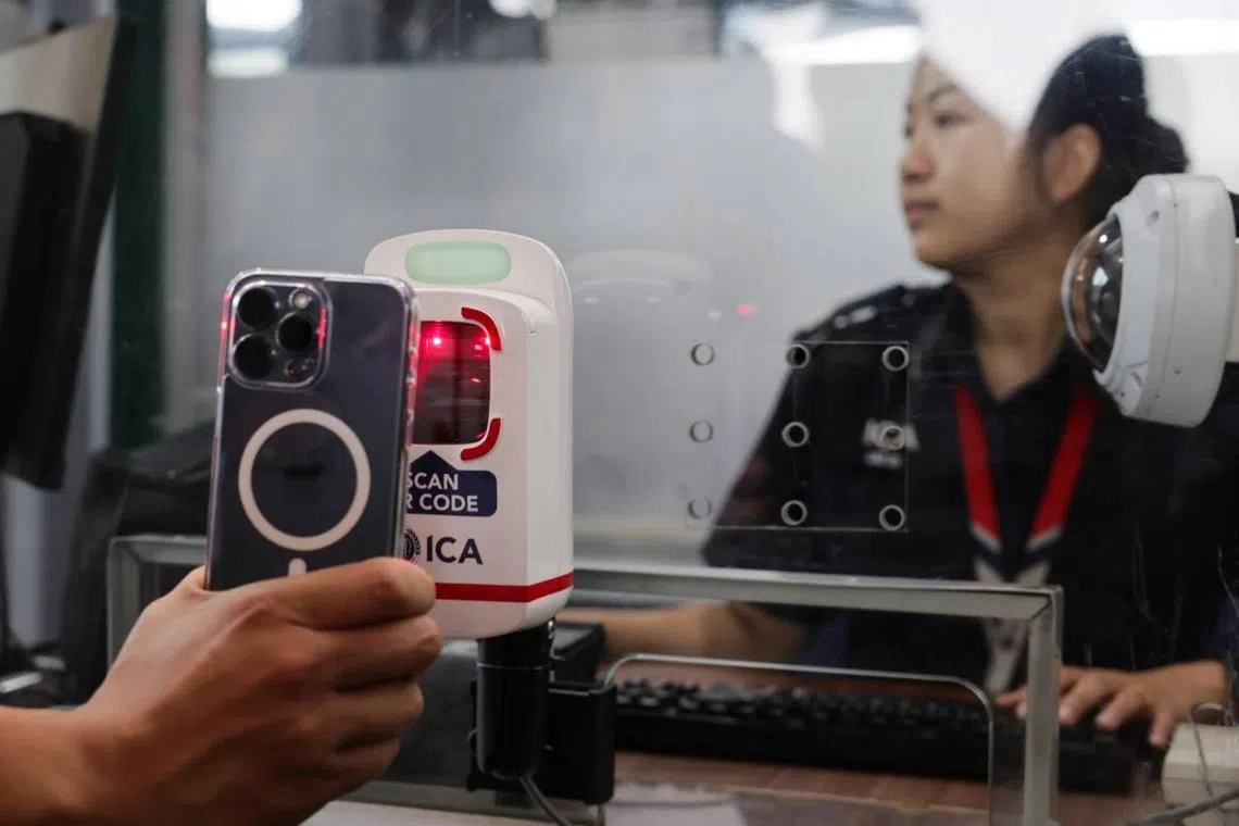 QR code immigration clearance for travellers in cars at Tuas, Woodlands ...