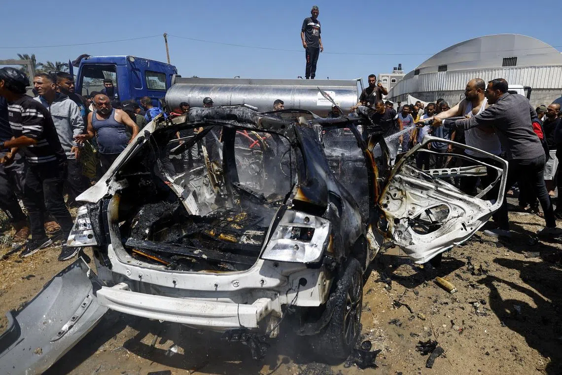 Israeli fire kills three people in Gaza, medics say | The Straits Times