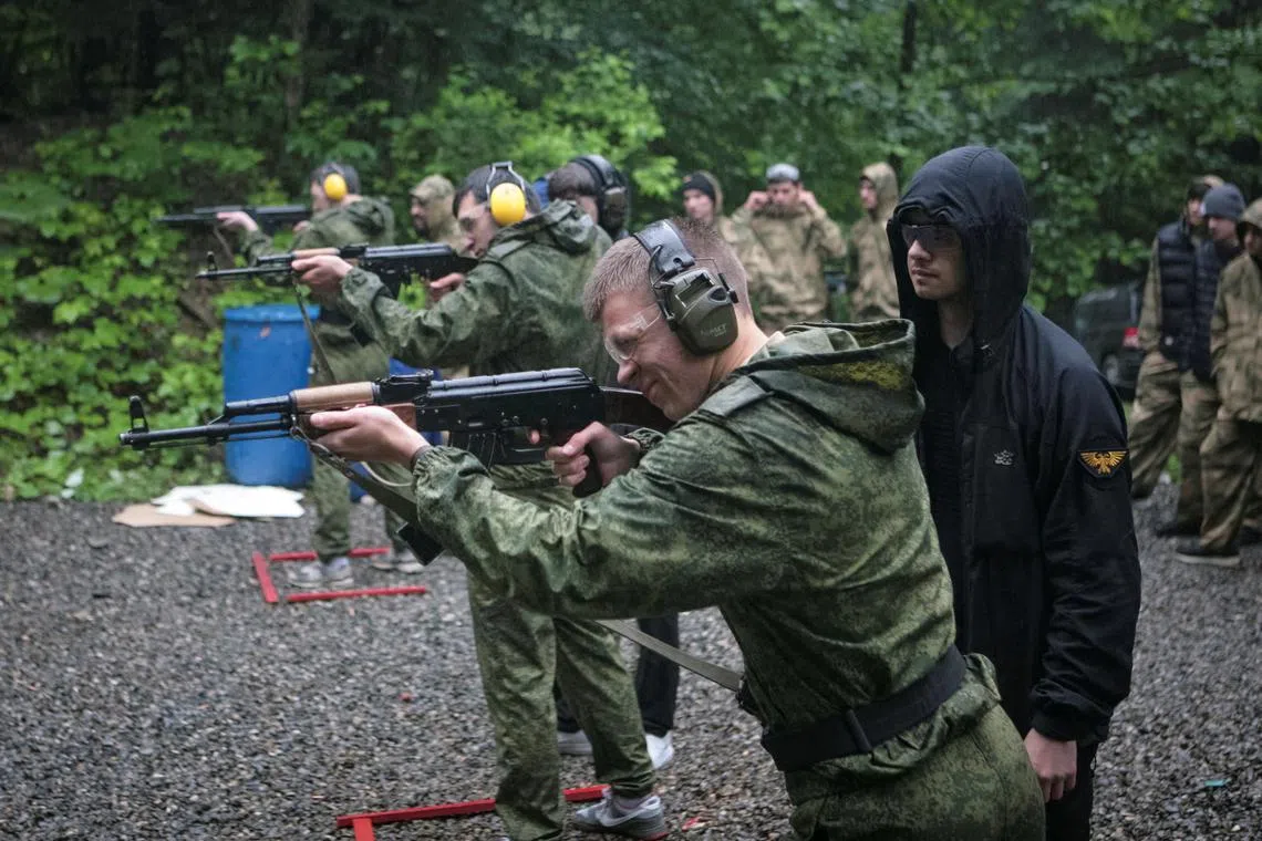 In Russia at war, kids swap classroom for shooting range | The Straits ...