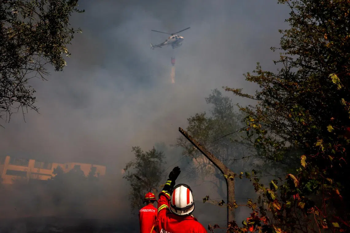 At least two die as wildfires hit Portugal, Europe sends help | The ...