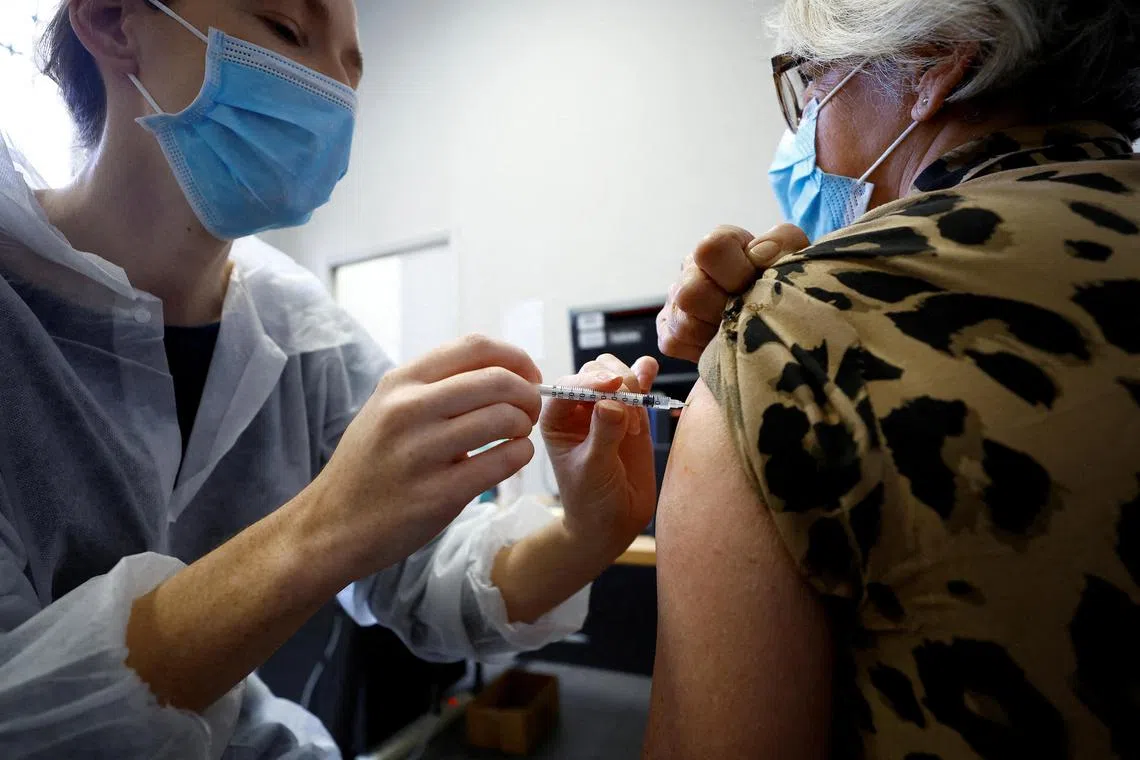 EU health regulator looking into annual Covid-19 vaccines | The Straits ...