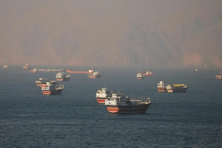 US officials say Iran pact signed, Hormuz traffic will rise ...