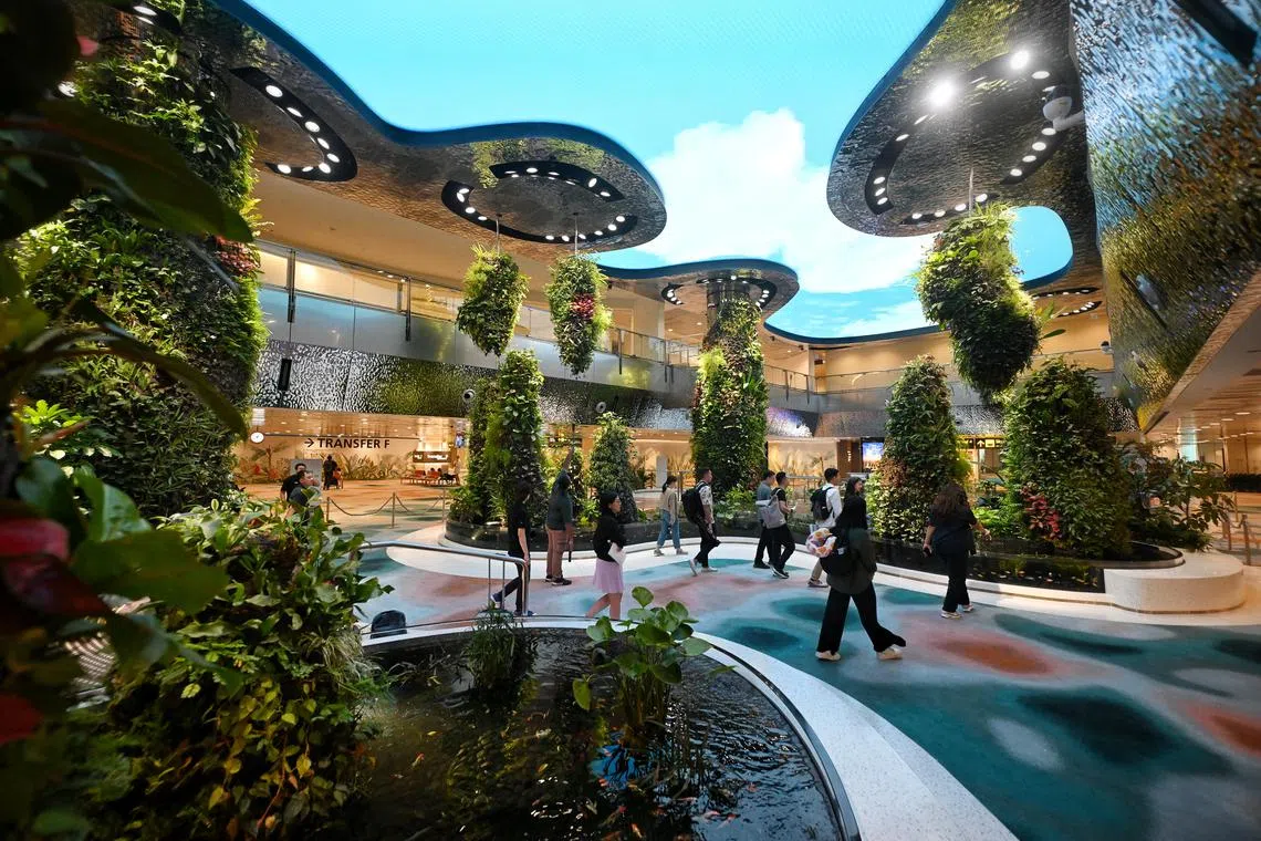 Changi Airport T2 reopens fully with 4-storey waterfall display, new ...