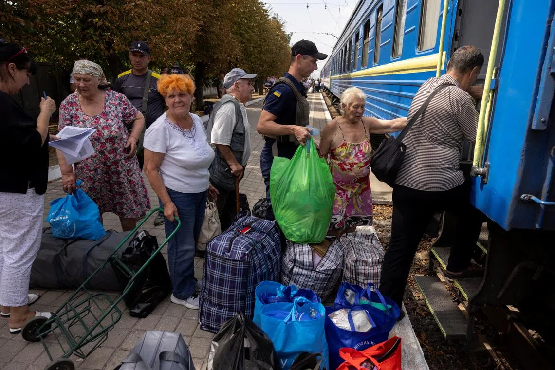 Frail and elderly flee east Ukrainian city as Russians advance | The ...