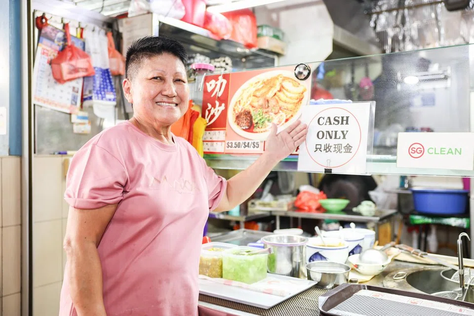 Why cash is still king for some hawkers in Singapore despite ...