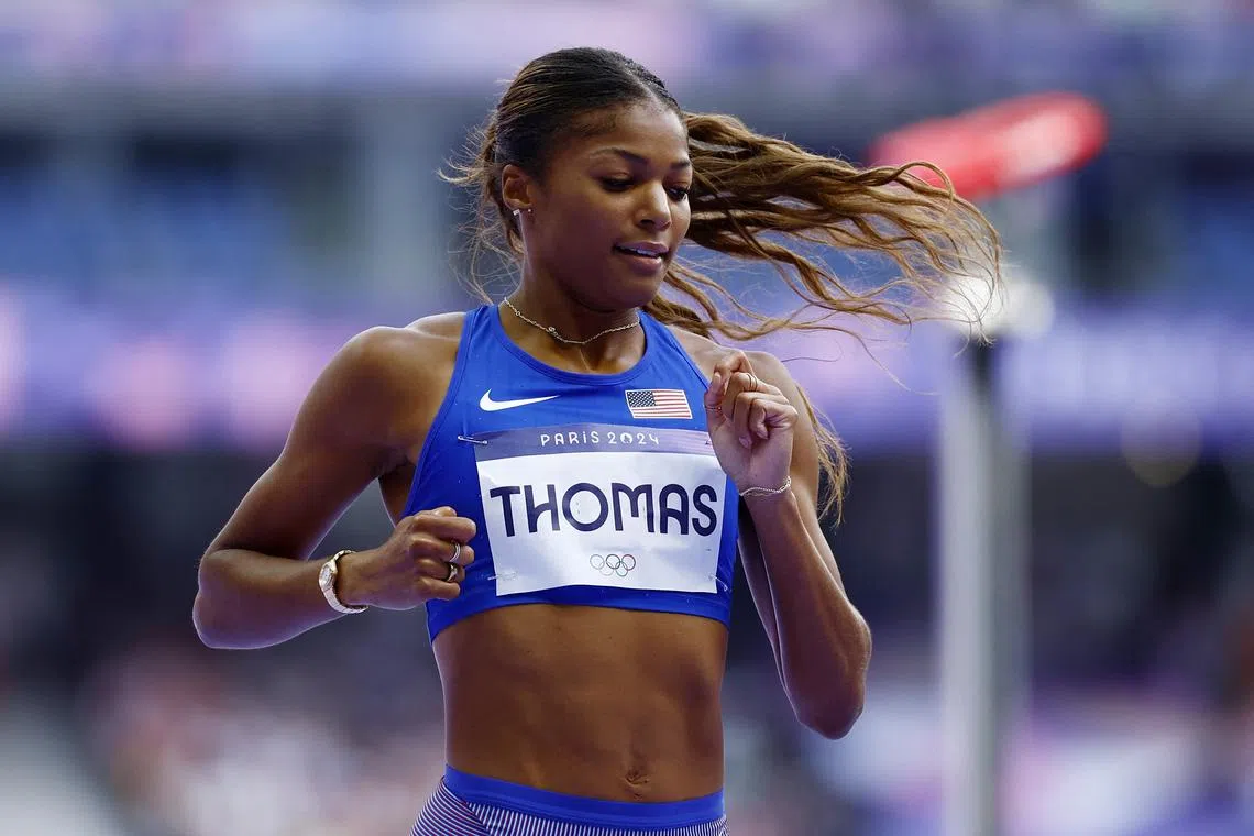 Athletics-Thomas of U.S. begins assault on Olympic 200m with fastest ...