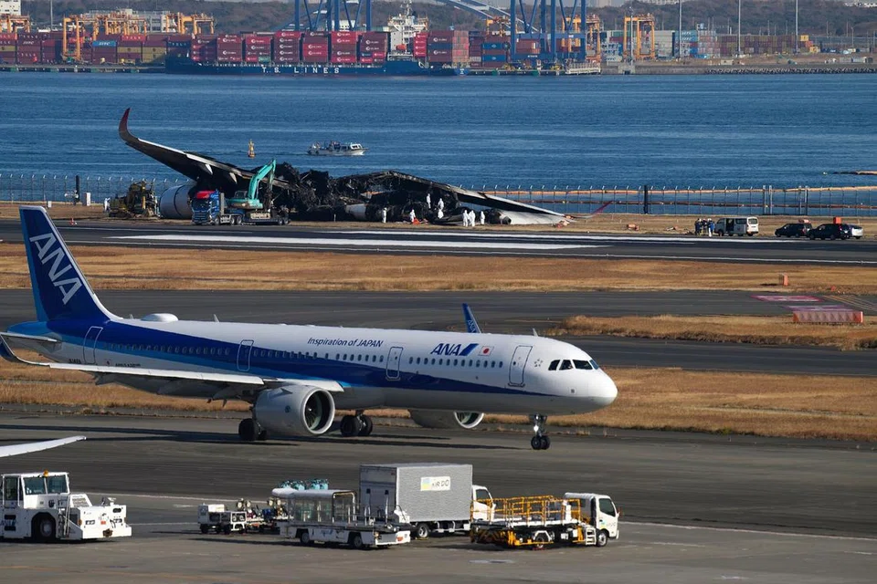 US-bound Japanese plane returns to Tokyo after man allegedly bites ...
