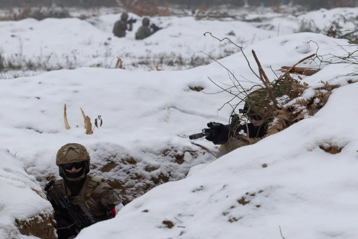Ukrainian troops train in Poland for harsh winter warfare | The Straits ...