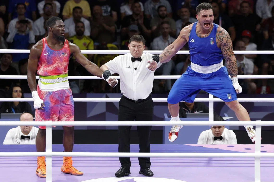 Boxing-Reigning champions Jalolov, Harrington win, Australia's ...