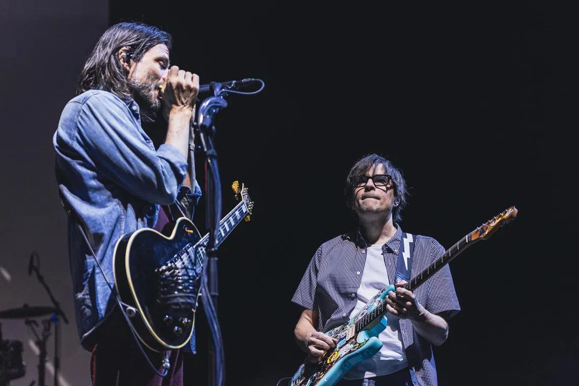 Concert review: US rock band Weezer eat durian, sing NDP song at ...