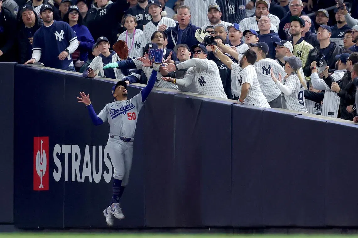 You're out! Yankees fans who grabbed Betts banned from Game 5 of World Series | The Straits Times