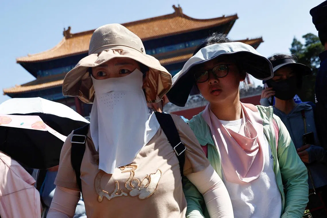 From ‘facekinis’ to arm sleeves, sun protection gear sells out in China ...