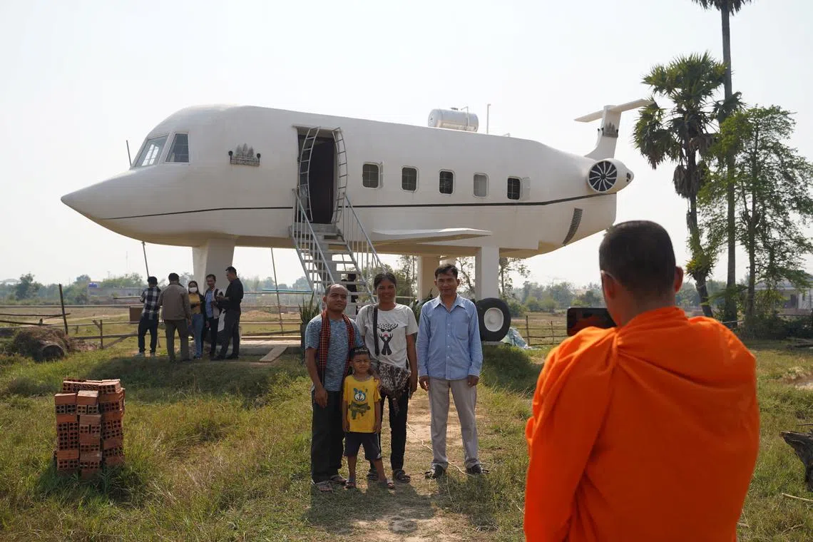 After saving up for 30 years, Cambodian man’s dream of ‘airplane house ...