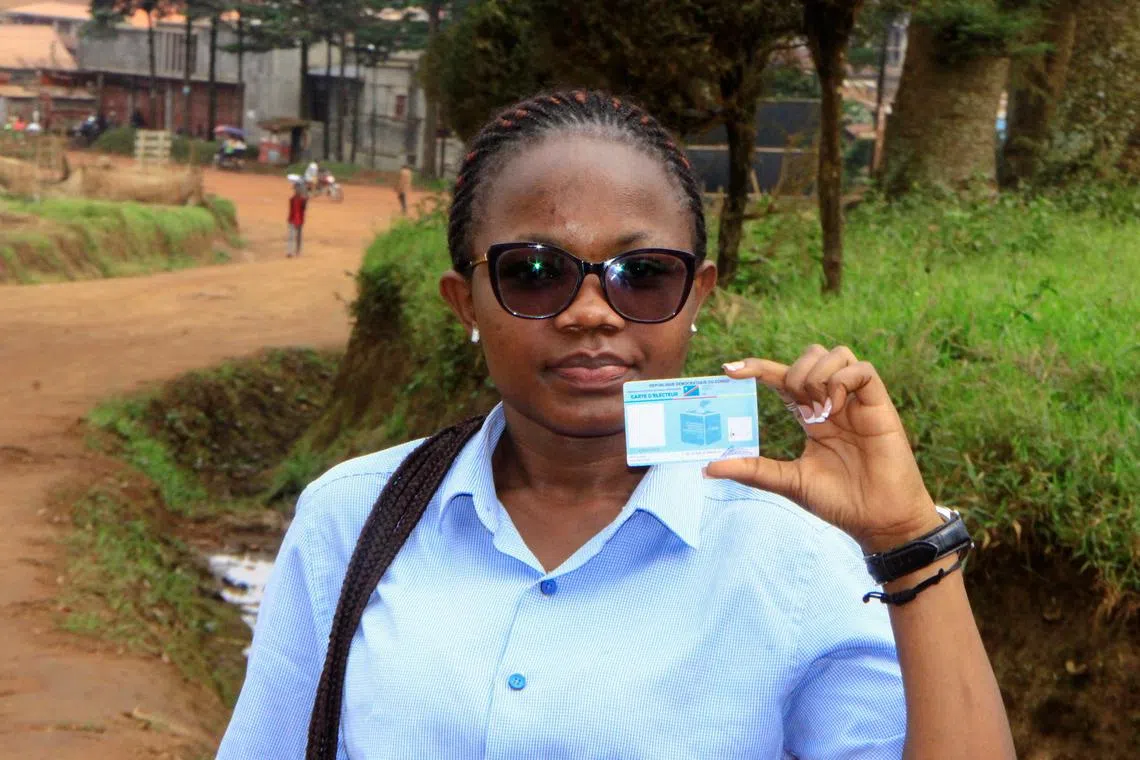 Smudged ID cards, missing names blemish Congo's $1 billion election ...