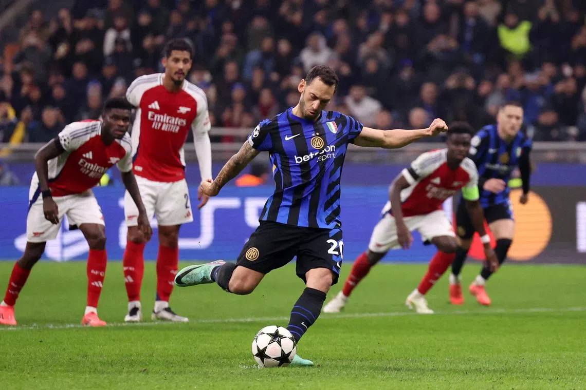 Hakan Calhanoglu fires unbeaten Inter Milan to Champions League win ...