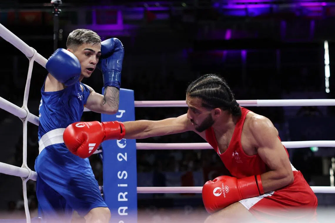 Boxing-Cuba's Lopez Cardona begins quest for third gold, Australia ...