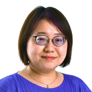 BookTalk: Singapore Computer Society president Lim Bee Kwan reads about ...