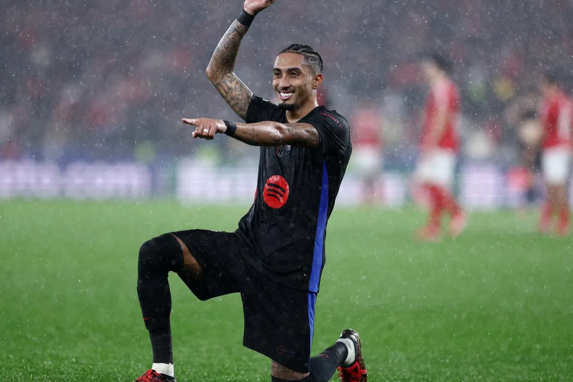 Late Raphinha strike earns Barca 5-4 win at Benfica and last-16 spot | The Straits Times