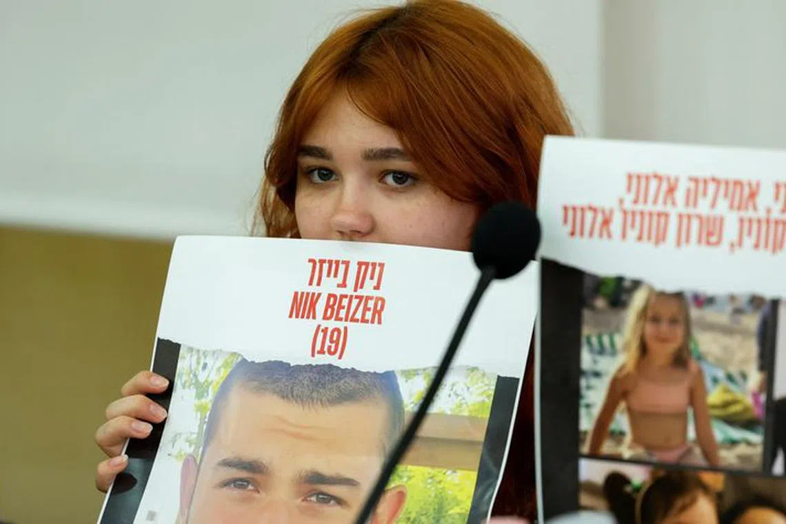 Israeli forces recover the bodies of a civilian, two soldiers held in ...