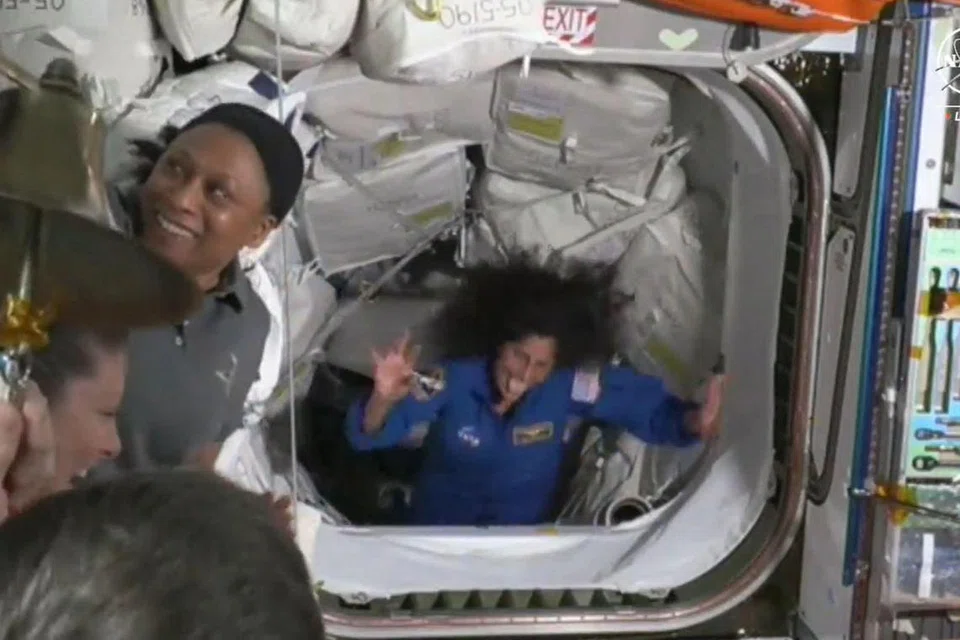 Boeing Starliner’s first astronaut crew welcomed aboard space station ...