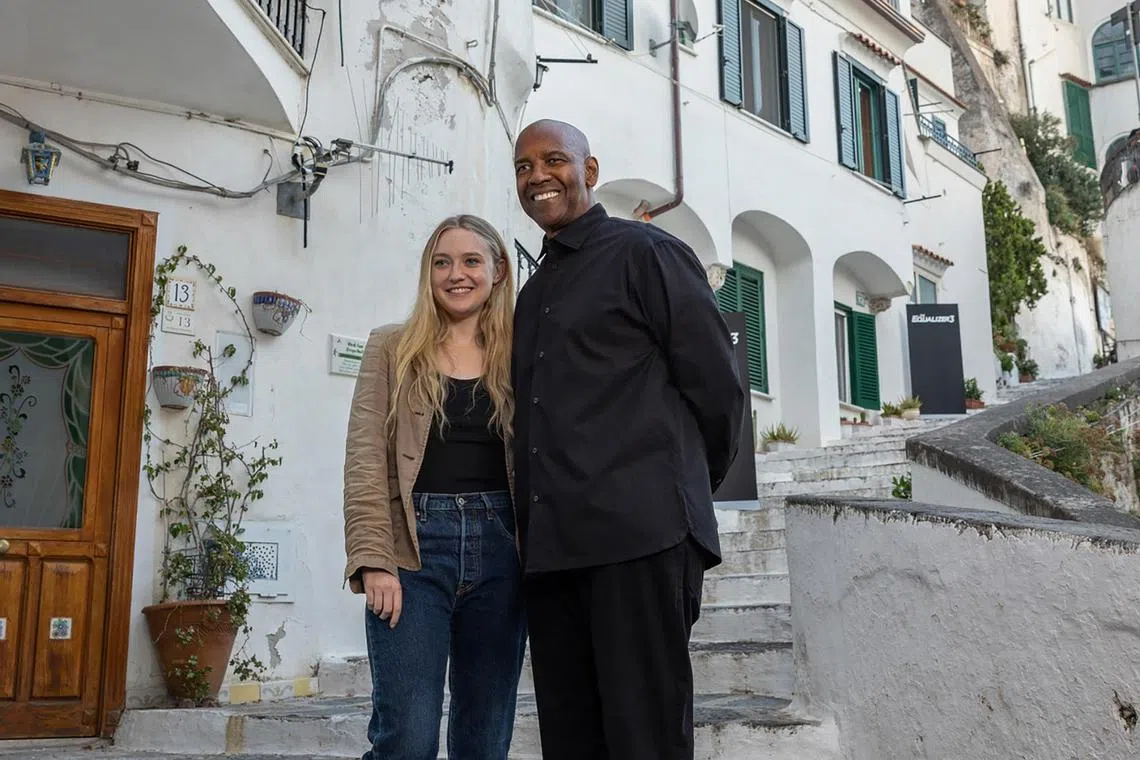 Dakota Fanning got to boss Denzel Washington around after reuniting on ...