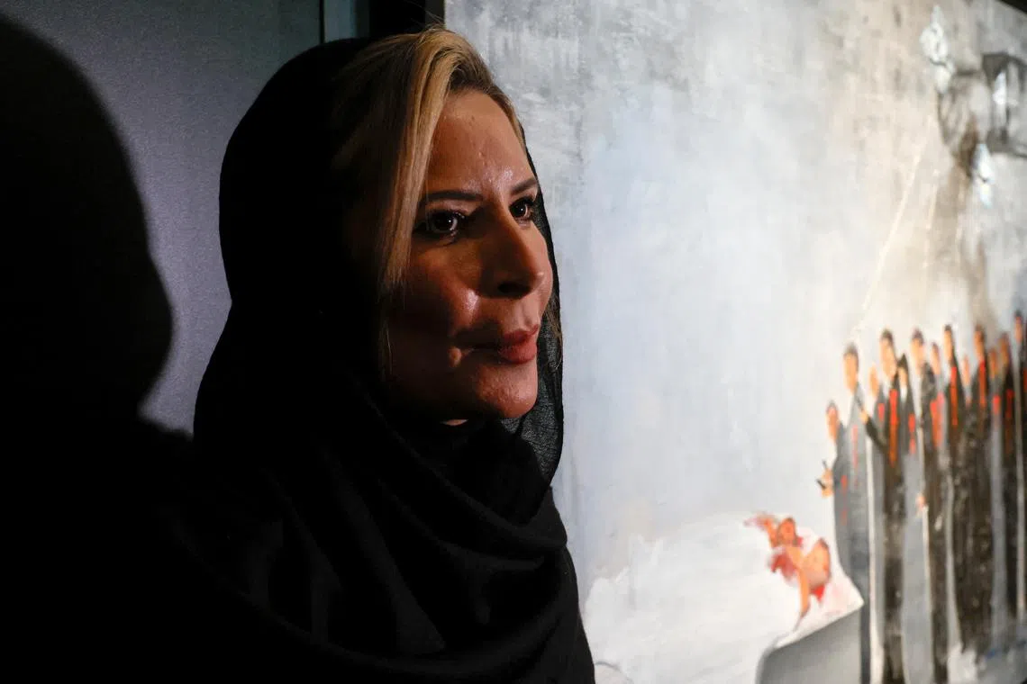 Moscow exhibits Gaddafi daughter's art, painted in slain Libyan leader ...
